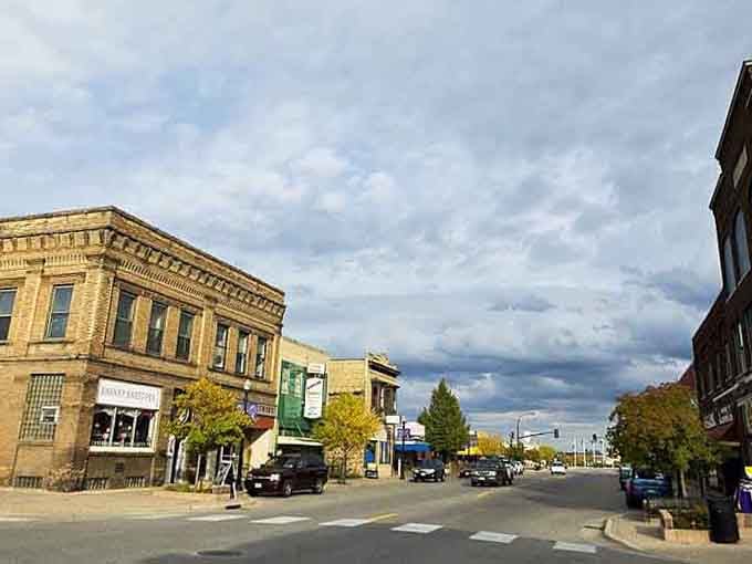 Autumn colors frame historic storefronts under dramatic skies that remind us why we love Minnesota seasons.