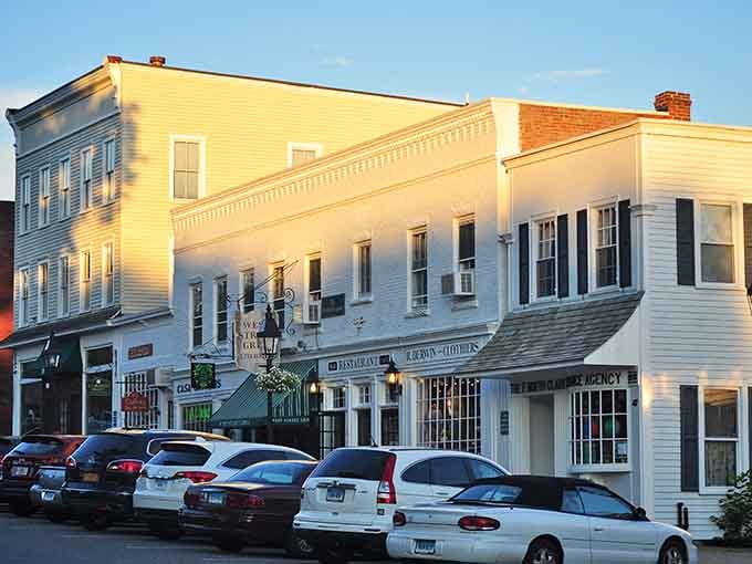 Golden hour bathes these storefronts in light so warm you can practically feel the glow through the photograph itself.