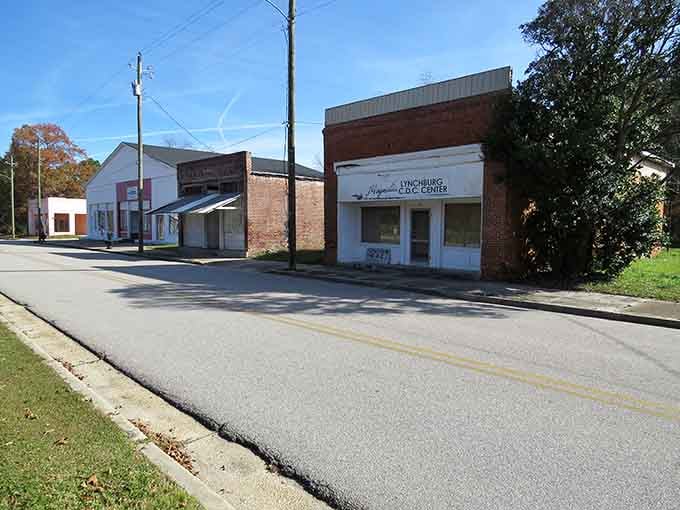 Brick storefronts line up like old friends, each one holding memories of generations who've walked these sidewalks.
