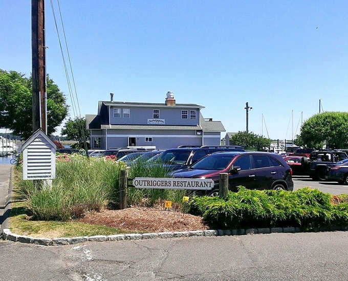 That full parking lot on a sunny day speaks volumes about the harbor views and fresh catches awaiting inside.