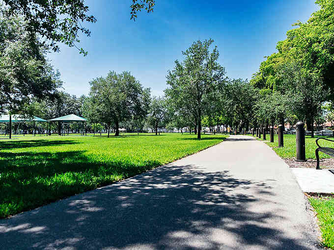 Tree-shaded walking paths invite leisurely strolls through parks so green and peaceful, you'll forget you're in a bustling metro area.