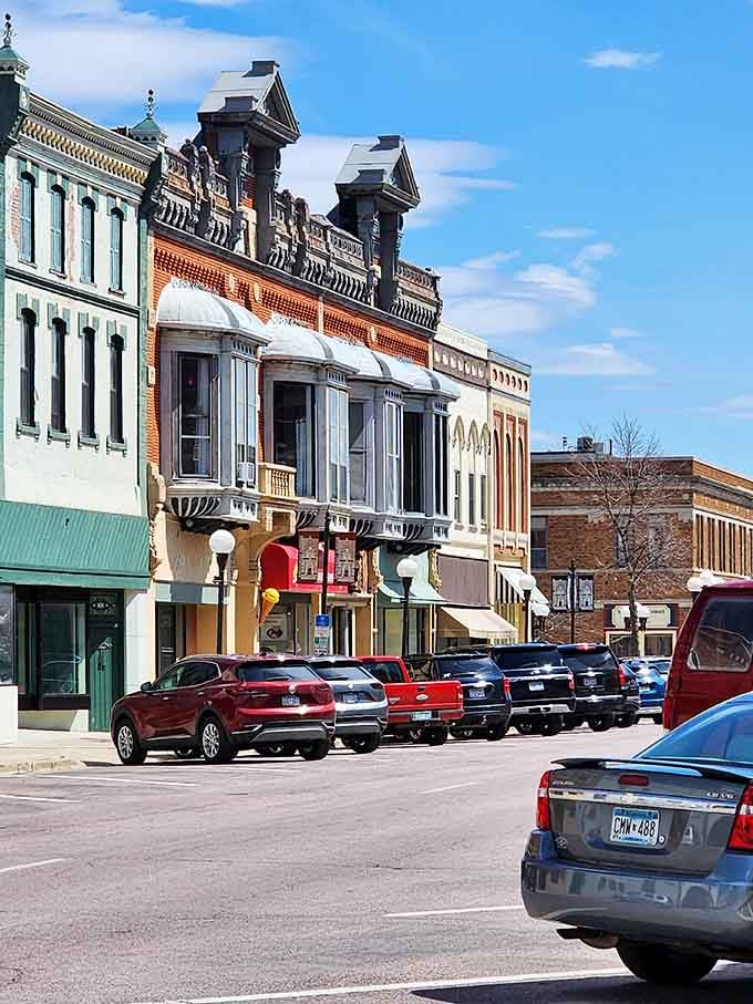 Classic brick buildings with decorative cornices line streets where parallel parking is still an art form.