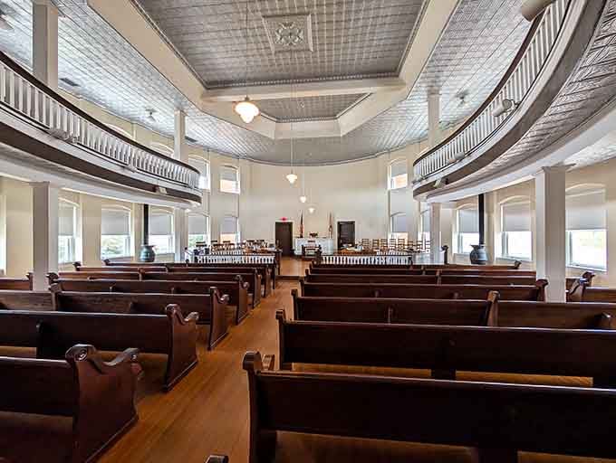 The courtroom's wooden pews and balcony create an atmosphere where you can almost hear Atticus Finch delivering his closing argument.