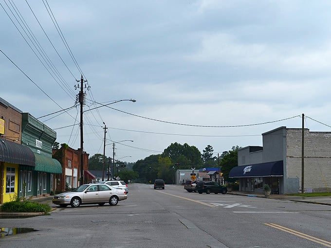 Hills rise in the distance beyond quiet intersections where life moves at its own pace.