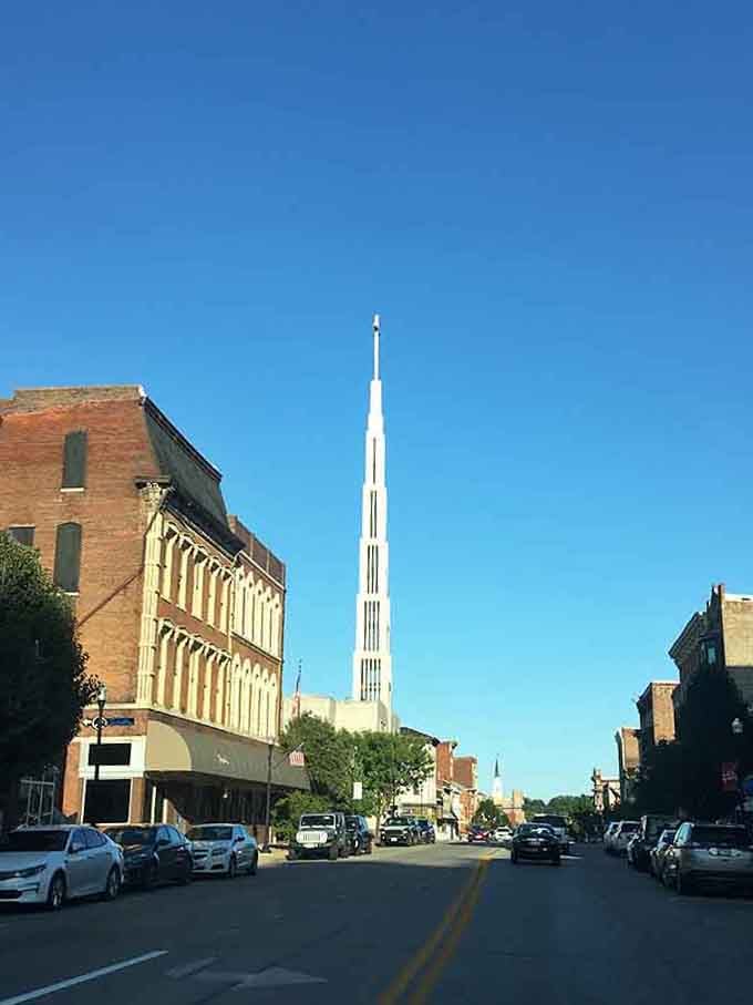 Modern spire meets historic brick in a downtown where past and present shake hands every single day.
