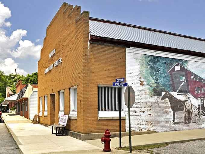 That vintage mural on brick tells stories when words alone just can't capture the heart of history.