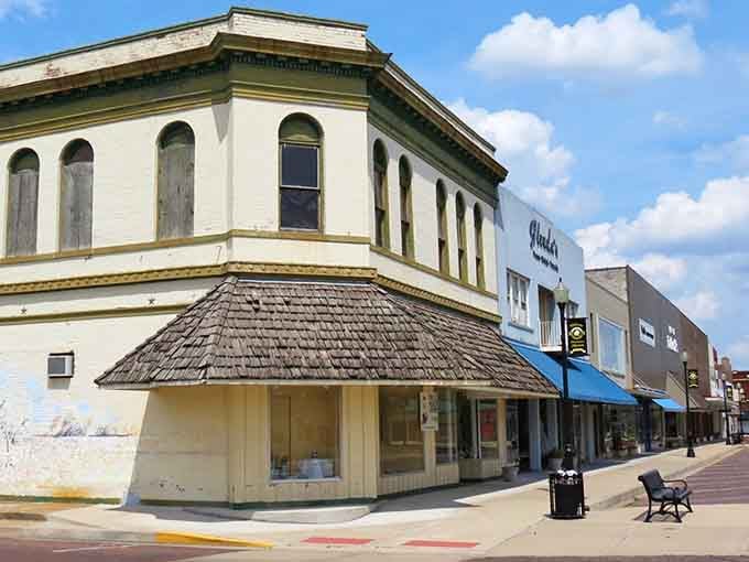 Corner buildings with vintage architecture stand as sentinels, watching over Main Street like faithful guardians of history.