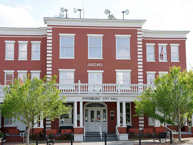 Statesboro's City Hall stands in classic red brick glory, proving that government buildings can have personality and charm to spare.