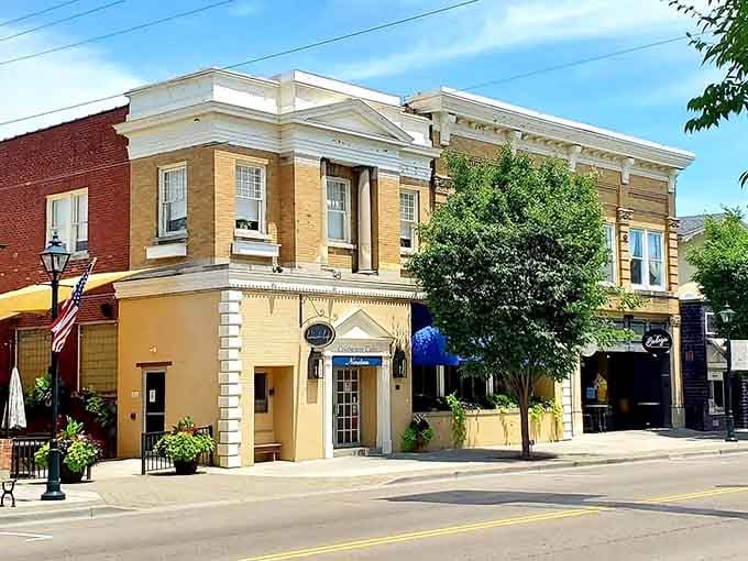 Those white pediments and symmetrical windows showcase timeless design that never goes out of fashion, just like good manners.