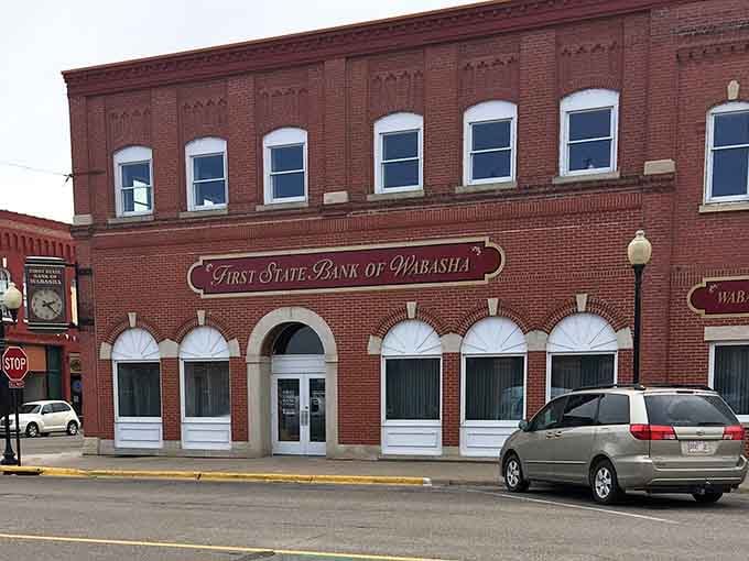 Historic red brick walls and arched windows greet you at the First State Bank during your afternoon stroll through Wabasha.