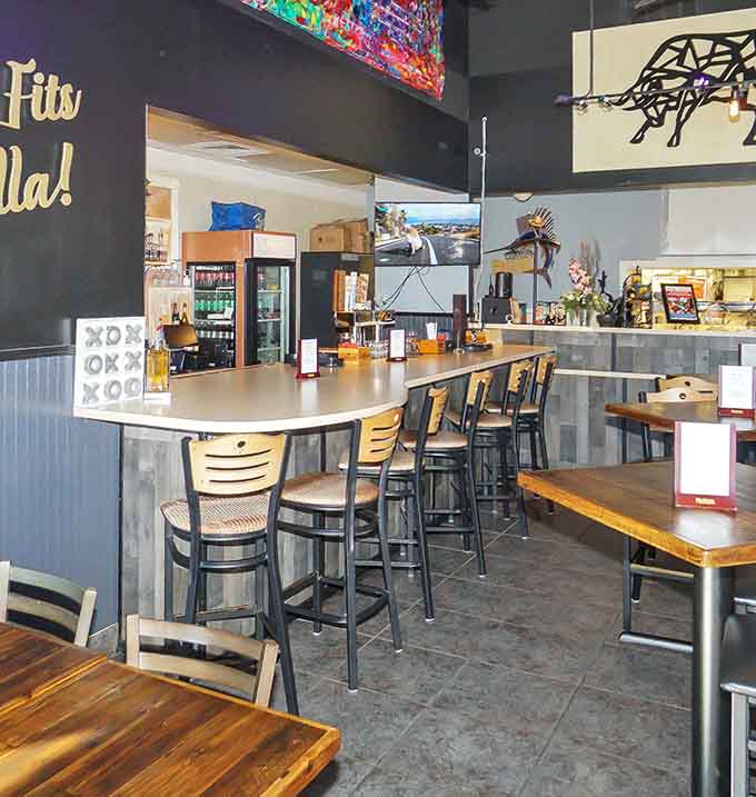 High-top seating near the bar means you can watch the action while enjoying your fusion creations.
