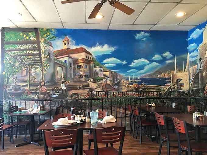 That Mediterranean coastline mural isn't just decoration, it's your passport to Italy without the jet lag.