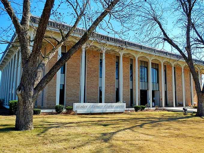 Henry County Courthouse's stately columns and manicured lawn command respect like Atticus Finch in his Sunday best.