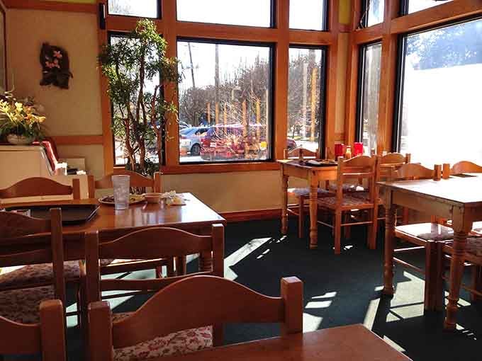 Sunlight streaming through those generous windows creates the perfect backdrop for a leisurely meal and good conversation.