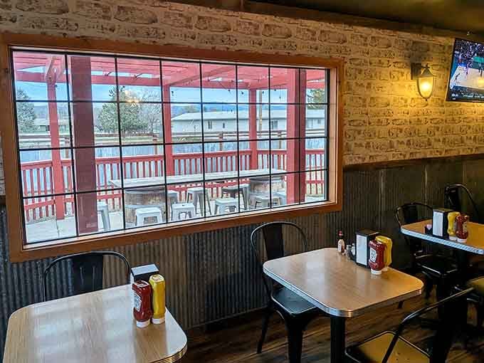 Simple tables and corrugated metal walls create the kind of authentic atmosphere money can't buy elsewhere.