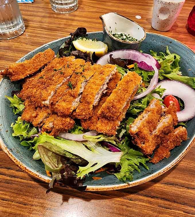 Even the salad gets the schnitzel treatment here because why should vegetables miss out on the breading party?