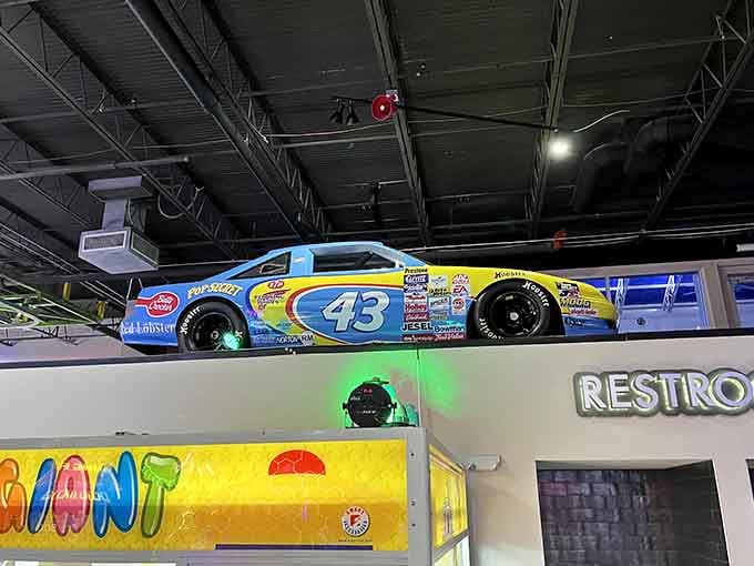 Even the decor celebrates racing heritage, reminding you that speed and competition run deep in this place.
