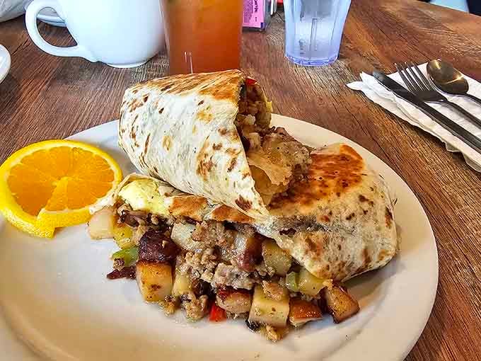 A breakfast burrito stuffed so full it needs its own zip code. This is serious morning fuel.