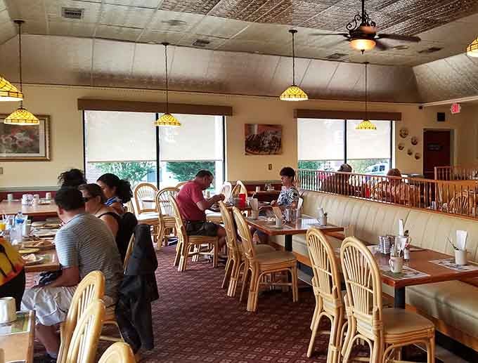 Happy diners enjoying their meals in a space that feels welcoming without trying too hard to impress.