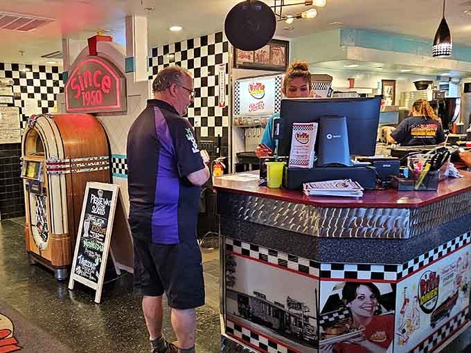 The jukebox stands ready to soundtrack your meal with hits from when music still told actual stories.