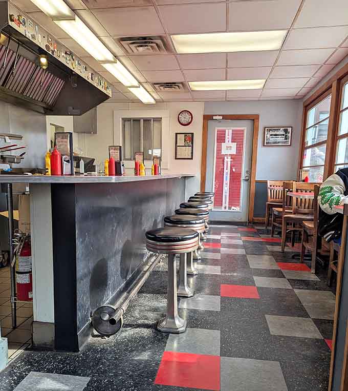 Counter seating with a view of the kitchen means watching your meal come to life in real time.
