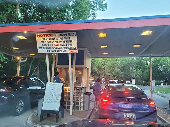 That entrance booth has seen generations of moviegoers pass through, each one seeking the same simple magic.