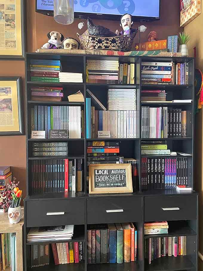 Local author bookshelf showcasing Warner Robins talent, because supporting your neighbors never goes out of style.