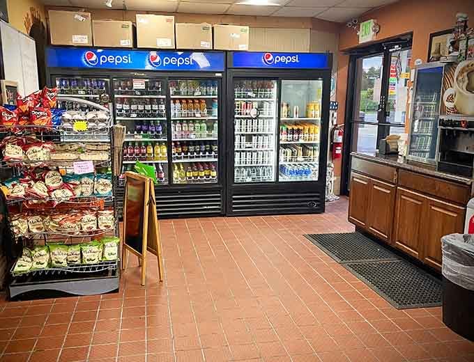 Cold drinks and snacks waiting patiently for customers who need something beyond the main attraction sandwiches.