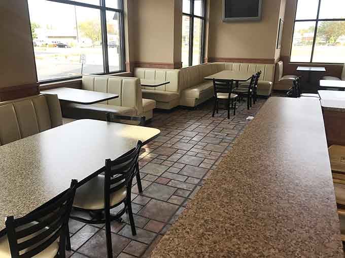 Booth seating with big windows means you can watch the world go by while contemplating your burger strategy.