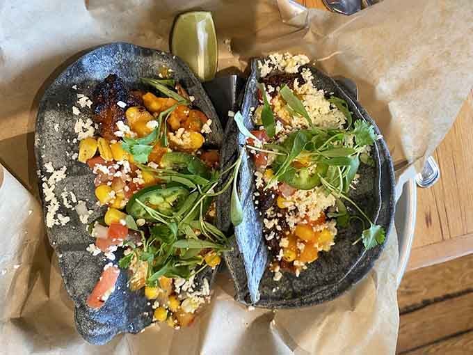 Blue corn tortillas cradling perfectly seasoned steak with all the fixings make Taco Tuesday jealous of every other day.