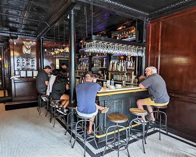 Pull up a stool at this handsome bar where the living and the dead apparently both enjoy a good pour.