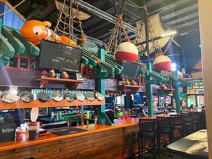 The bar area channels serious fishing lodge vibes with enough character to make every drink taste better.