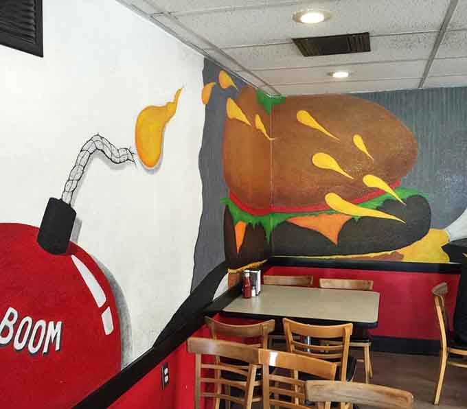 Wall murals featuring exploding burgers and cartoon bombs remind you that subtlety isn't always necessary when you're having fun.