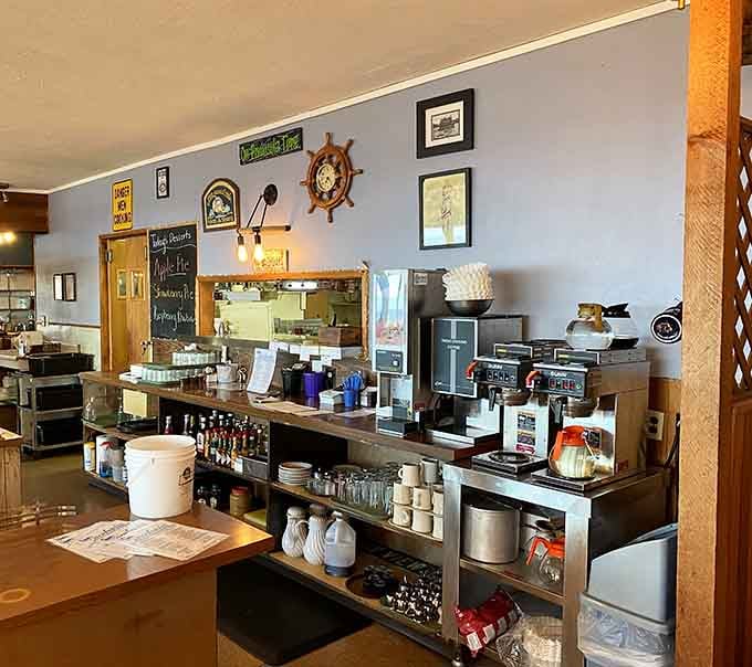 The prep station where maritime magic happens, complete with a ship's wheel reminding you where dinner came from.