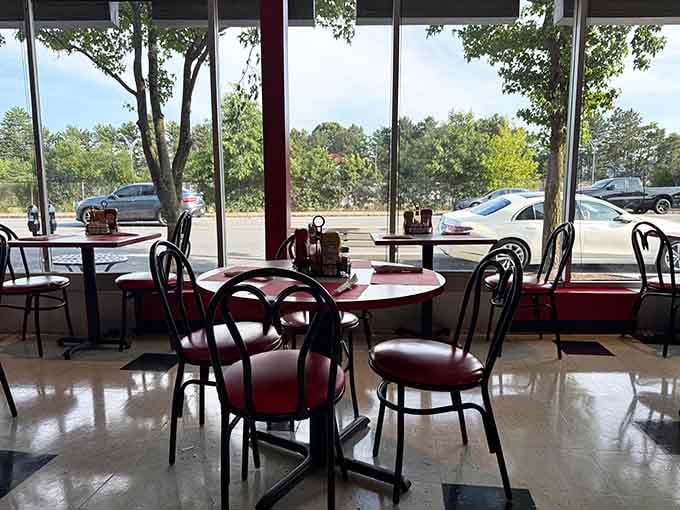 Window seats offer prime people-watching real estate while you tackle your sundae with focused determination and joy.