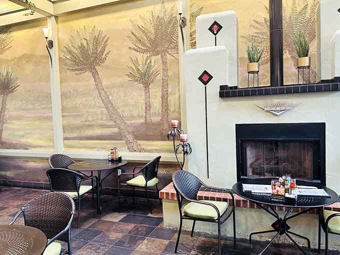 Palm tree murals and a fireplace create an atmosphere that's part California dreaming, part cozy Portland reality.