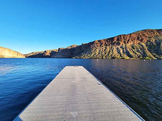 This pristine dock stretching into sapphire water at sunrise makes you want to cancel all your other plans.