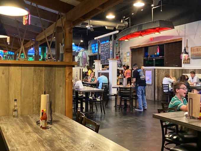 Every angle reveals another nautical detail, from the turquoise beach house to the ship's wheel watching over diners.