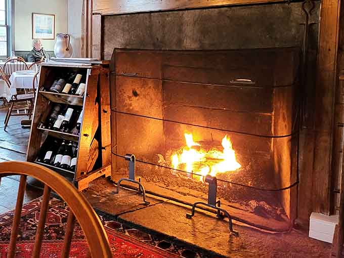 Nothing says colonial comfort like a crackling fireplace warming your bones while you dine in style.