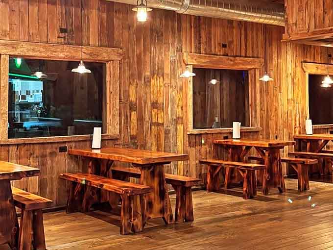 Rustic wooden tables and benches create a casual atmosphere where the food does all the talking it needs to.