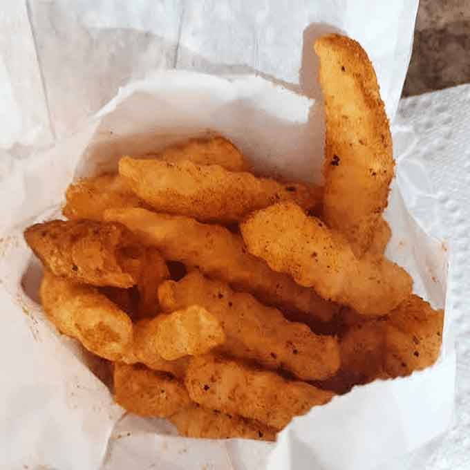 Seasoned crinkle fries that understand their assignment: be delicious and don't apologize for the carbs.