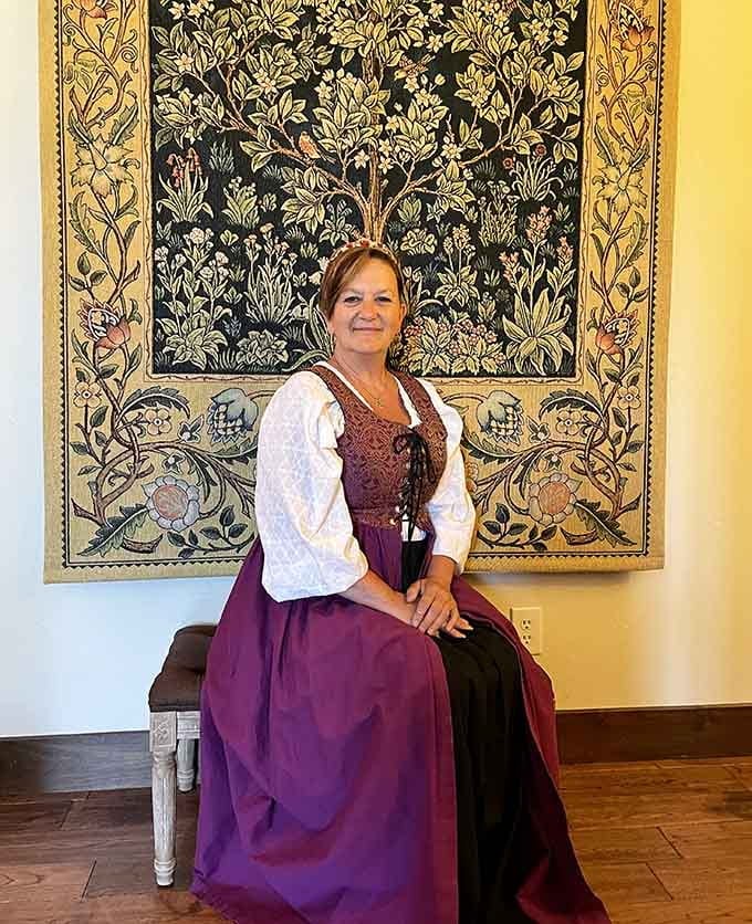 Period costume and ornate tapestry prove this castle encourages guests to embrace their inner Renaissance soul.