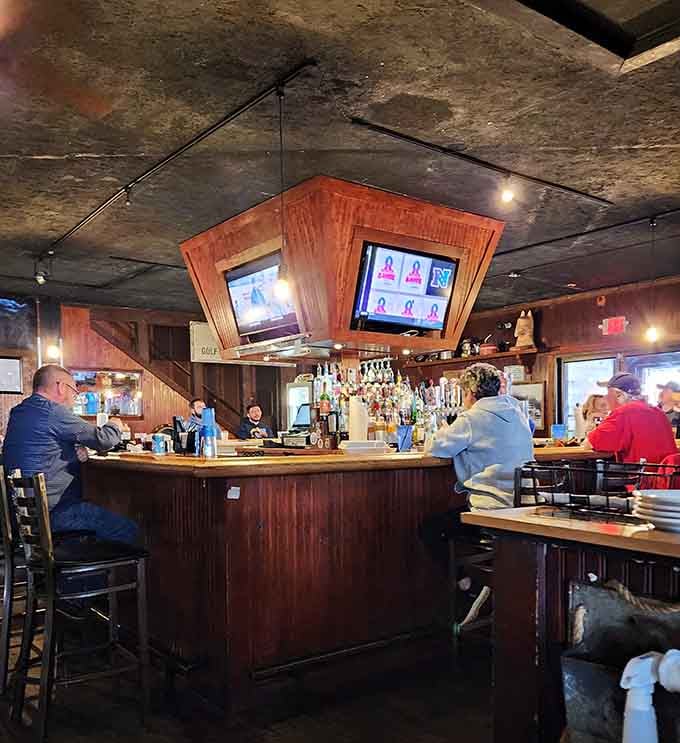 The bar where locals gather, stories flow, and cold drinks meet warm hospitality in perfect harmony every single time.