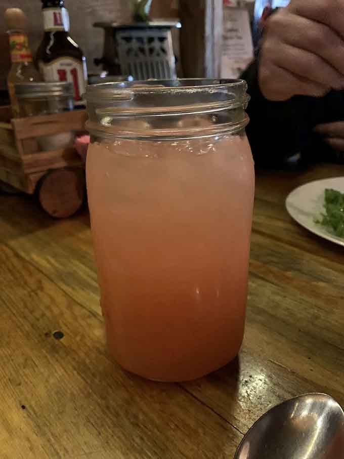 Pink lemonade in a mason jar, refreshingly tart and sweet, the perfect companion to your epic feast in the desert.