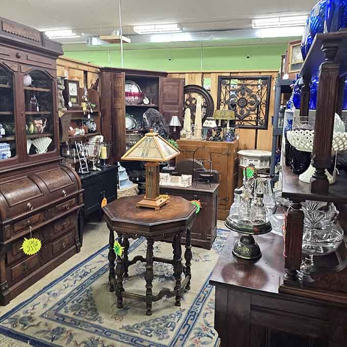 Antique furniture and glassware arranged like a museum where everything's actually available to purchase.