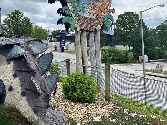 Even the Flintstones would approve of this whimsical prehistoric billboard welcoming visitors to dinosaur-themed putting paradise.