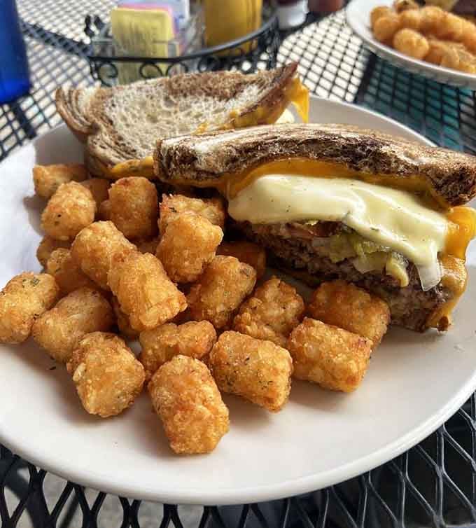 A patty melt with tater tots because sometimes lunch needs to channel its inner childhood cafeteria nostalgia.