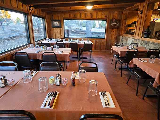 Simple tables set with care overlook the ranch landscape, proving fancy linens can't compete with genuine hospitality and good food.