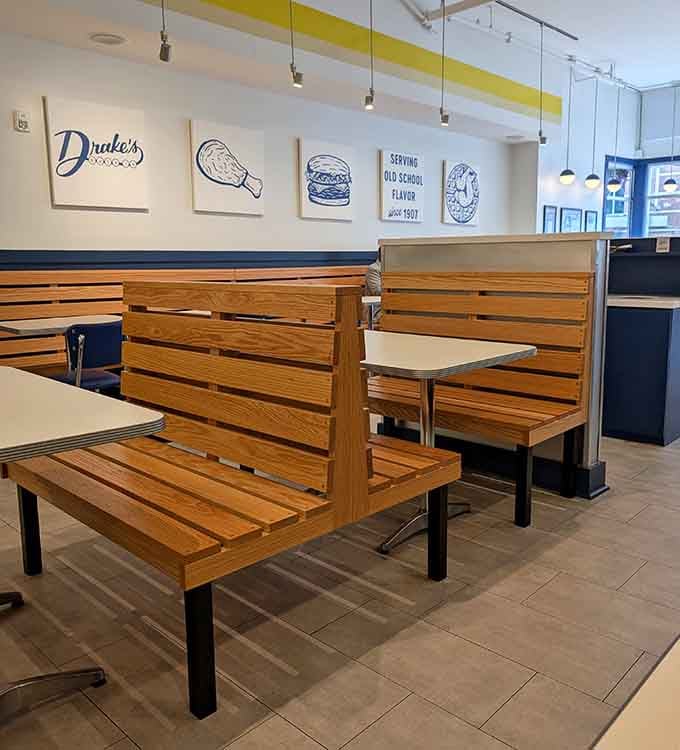 Wooden booths that invite you to sit, stay awhile, and enjoy every single bite without rushing anywhere.