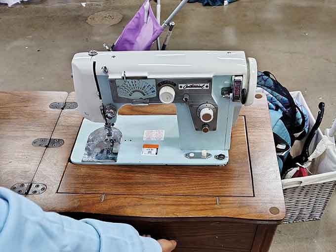 A vintage sewing machine ready for its comeback tour, because everything old eventually becomes cool again somehow.